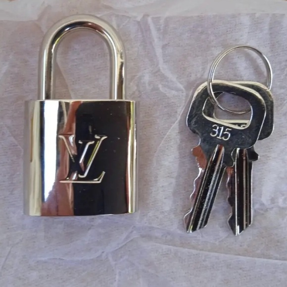 Louis Vuitton | Bags | Authentic Louis Vuitton Silver Lock And Key35 ...